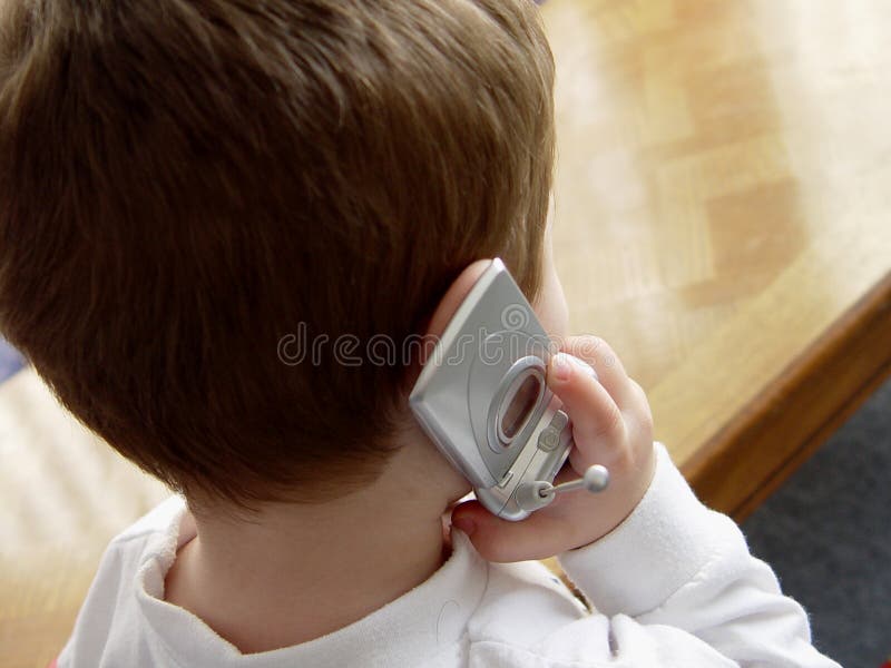 Boy with Cell Phone stock image. Image of equipment, corporate - 2803
