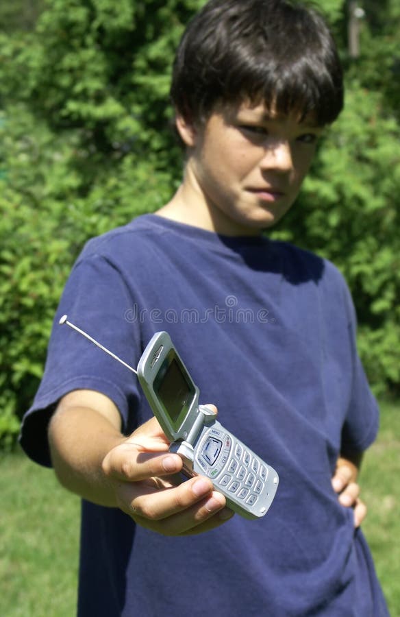 Boy and cell phone stock photo. Image of phones, communication - 204538