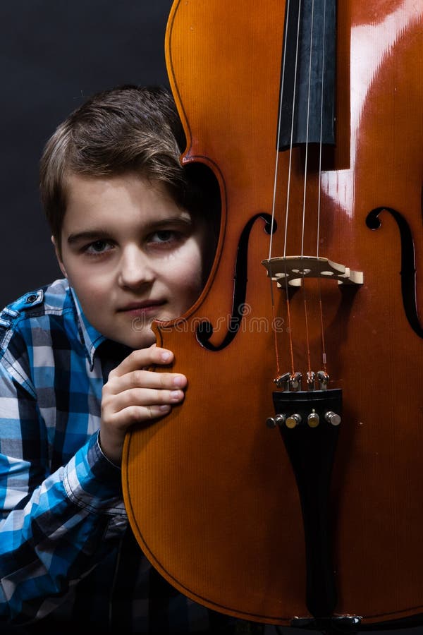 Boy with cello stock image. Image of music, cello, classical - 50142023