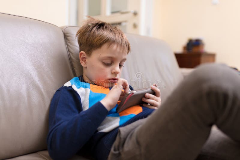 Boy with cellphone stock photo. Image of toddler, cute - 245456710