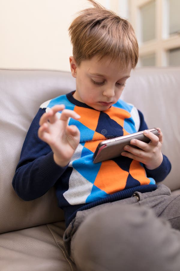 Boy with cellphone stock image. Image of cellphone, portrait - 245456723