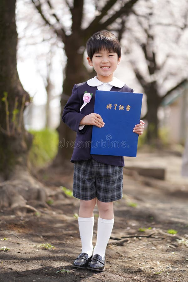 Boy with a certificate stock image. Image of japan, spring - 245010829