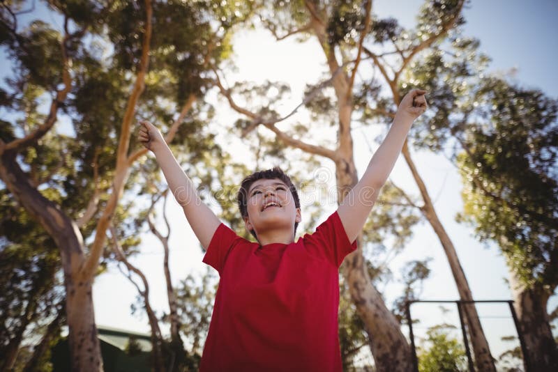 Boy Cheering during Obstacle Course Stock Photo - Image of cute ...