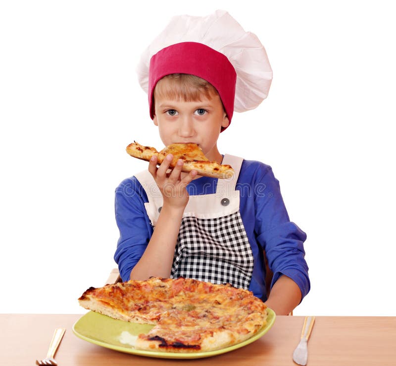 Boy chef eat pizza stock photo. Image of cook, crust - 33078172