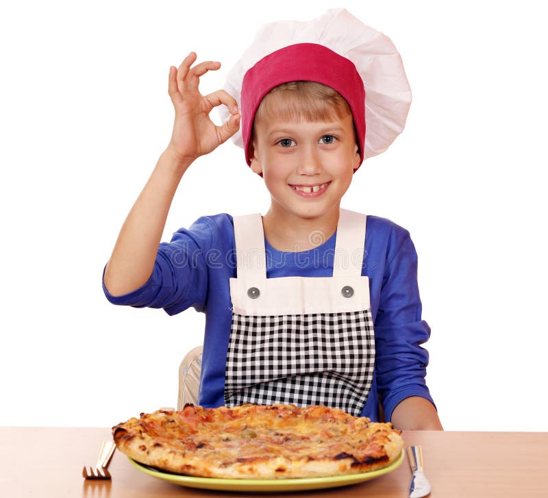 Boy chef eat pizza stock photo. Image of cook, crust - 33078172