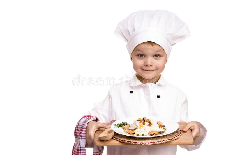 Boy chef prepares rice stock image. Image of seafood - 82180153