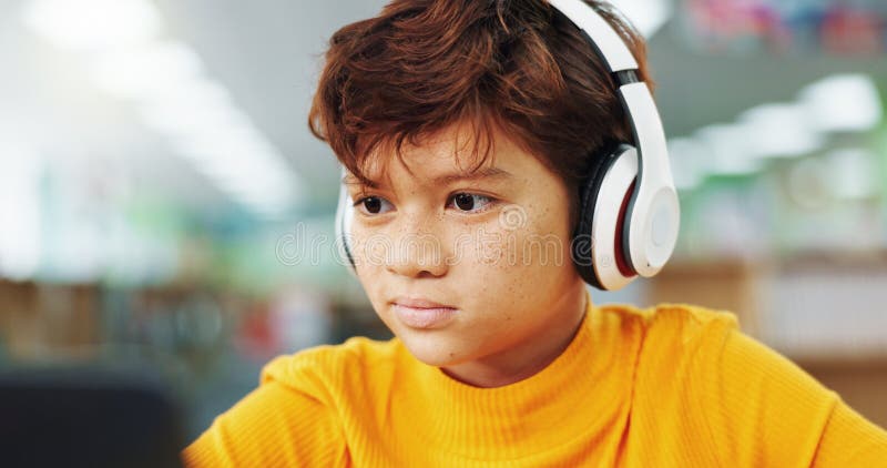 Boy, Child and Headphones with Computer at Library for E Learning ...