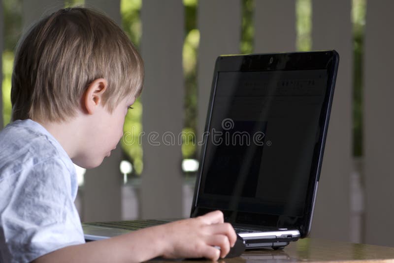 Boy Child Looking at Laptop Screen Stock Photo - Image of typing, game ...