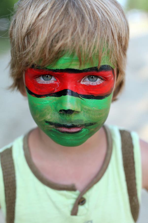 Boy Child with a Mask on Her Face Stock Photo - Image of colorful ...