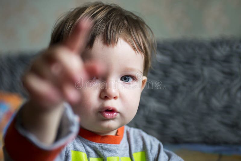 Little Boy Who Points A Finger Stock Image - Image of look, attention ...