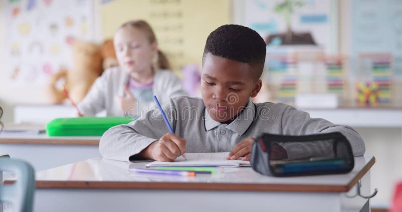 African Boy, Child and Writing in Classroom with Studying, Listening or ...