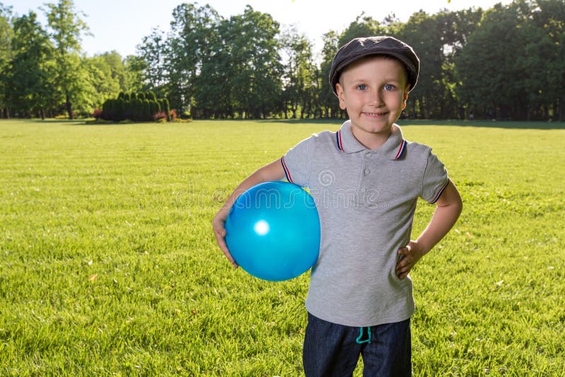 Boy children playing ball stock image. Image of happiness - 54436357