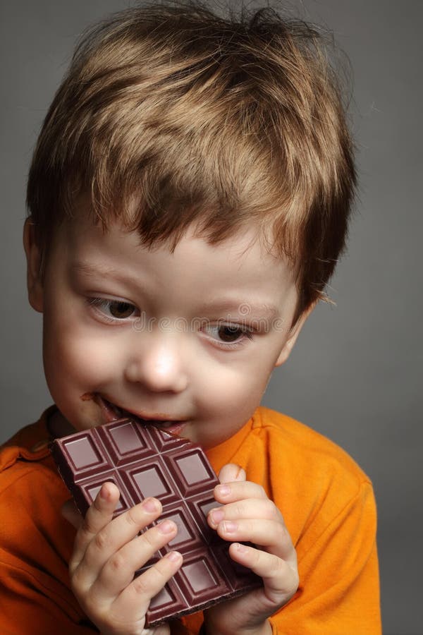 Boy with chocolate stock photo. Image of still, milk - 23163124