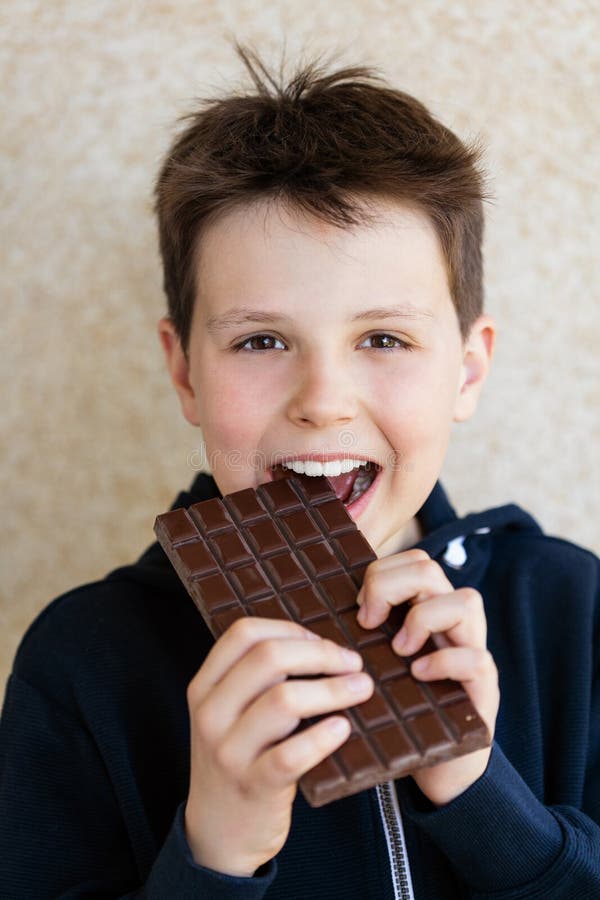 Boy with a chocolate stock image. Image of head, chocolate - 224746553