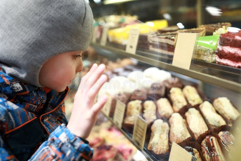 Boy Choosing Cake in Cafe Showcase Stock Photo - Image of indoor ...