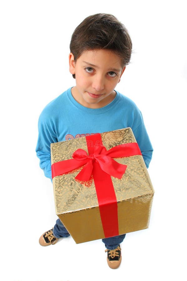 Boy with a christmas gift stock image. Image of birthday - 1216845