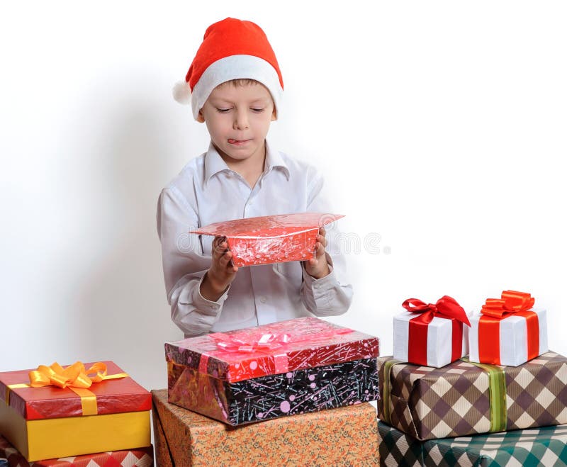 Boy with Christmas Present Boxes Stock Image - Image of smile, large ...