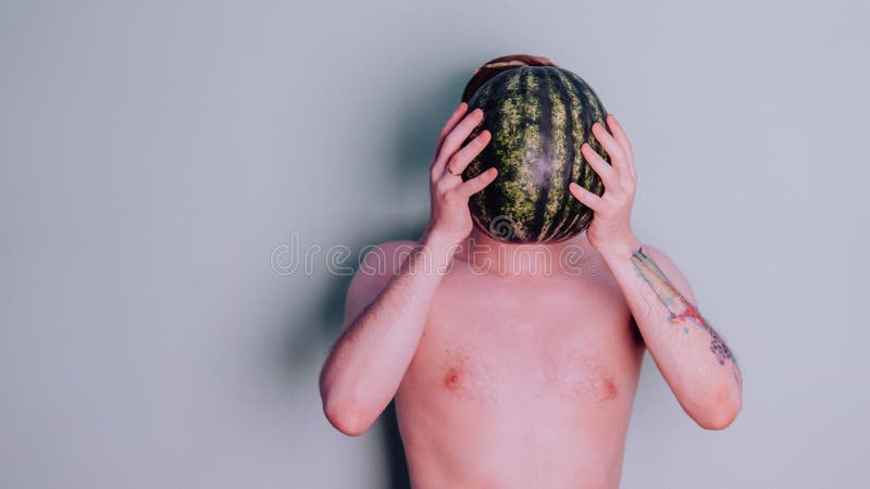 A Man and a Watermelon / Boy in Classic Suit with a Watermelon Stock ...
