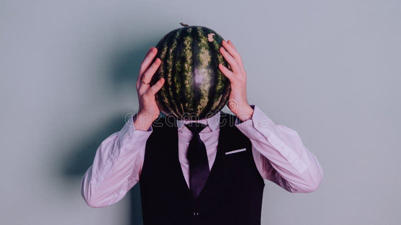 A Man and a Watermelon / Boy in Classic Suit with a Watermelon Stock ...