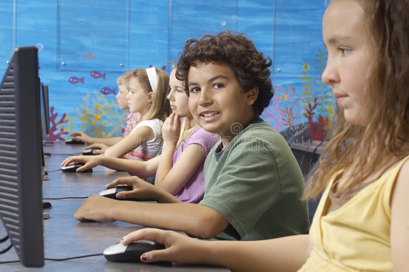 Boy with Classmates in Computer Lab Stock Image - Image of educational ...