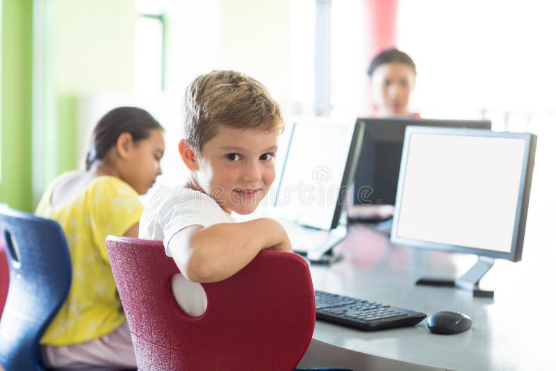Boy with Classmates and Teacher in Computer Room Stock Image - Image of ...