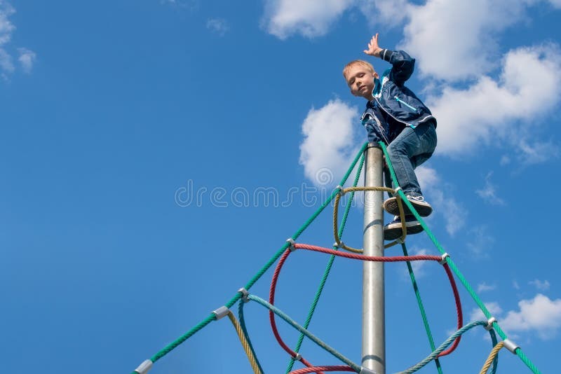 The Boy Climbed Up on the Top Stock Photo - Image of active, happy ...
