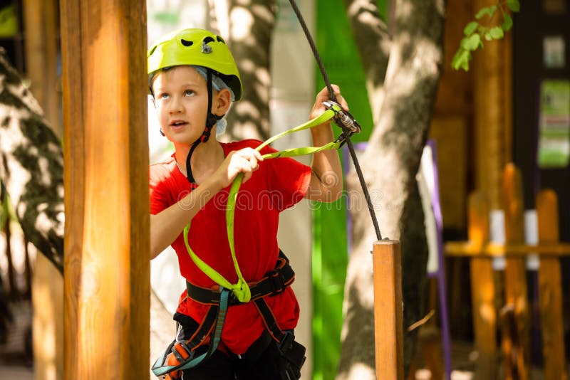 Boy Climber Walks on the Rope Bridge, Stock Photo - Image of summer ...