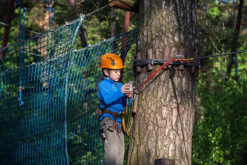Boy Climbing in Adventure Park , Rope Park Stock Photo - Image of ...