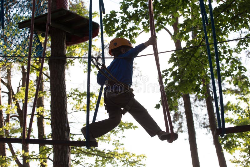Boy Climbing in Adventure Park , Rope Park Stock Photo - Image of ...