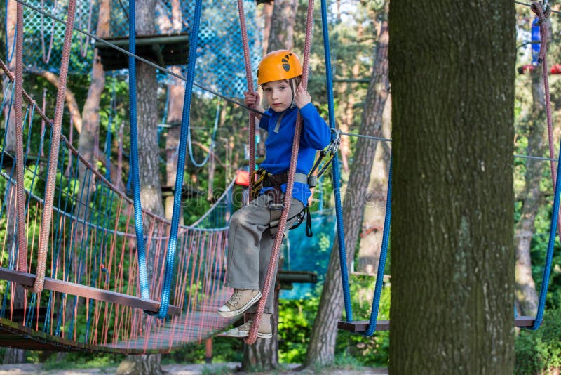 Boy Climbing in Adventure Park , Rope Park Stock Photo - Image of ...
