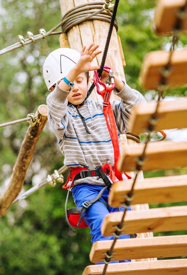 Boy Climbing Rope-ladder in Adrenalin Park Stock Image - Image of ...