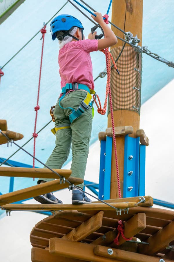 Boy in rope park stock photo. Image of play, challenge - 136505244