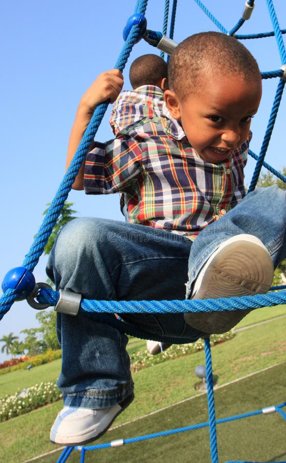 Child Climbing Ropes stock image. Image of outside, outdoors - 5489383