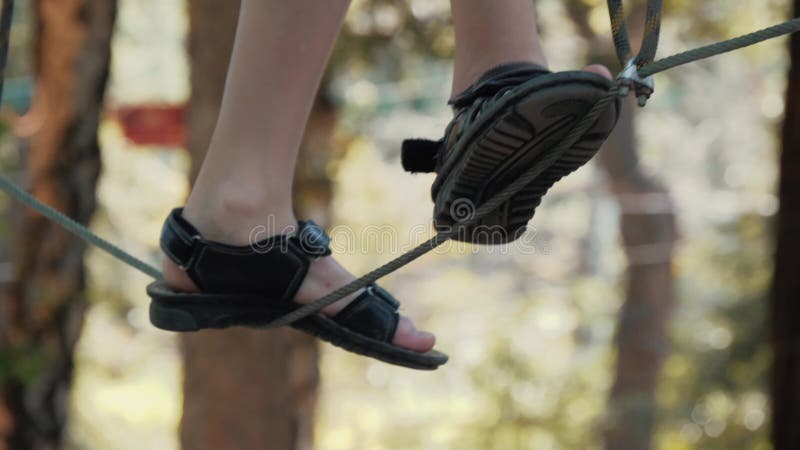 The Boy Climbs the Obstacle Course in the Camp. a Brave Boy Fulfills ...