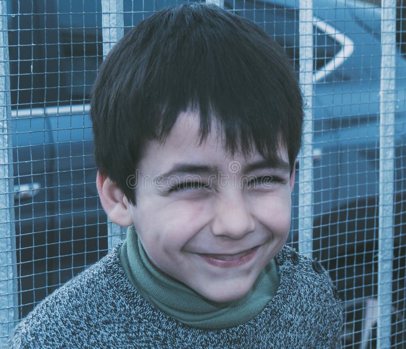 Boy with Closed Eyes Smiling Stock Photo - Image of people, eyes: 94415644