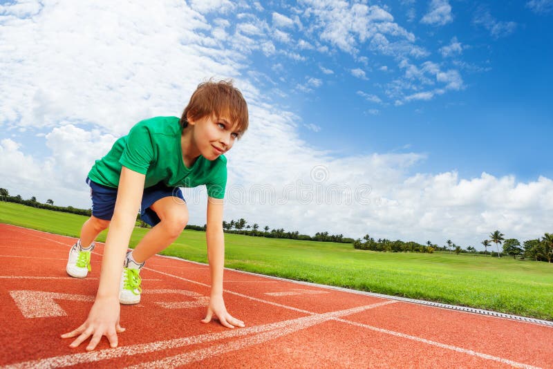 Boy in Colorful Uniform on the Start Ready To Run Stock Photo - Image ...