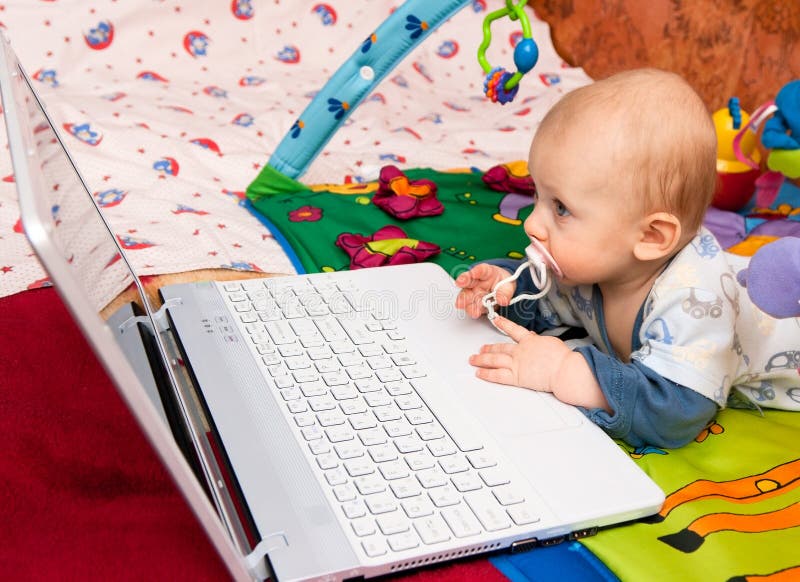 Baby boy shopping on-line stock image. Image of laptop - 10345503