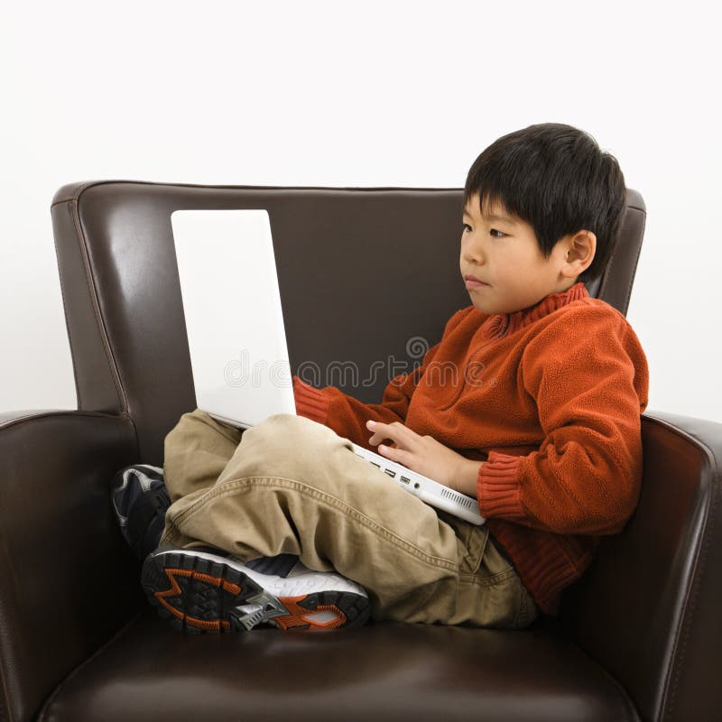 Boy with computer stock image. Image of cute, person, home - 4416155