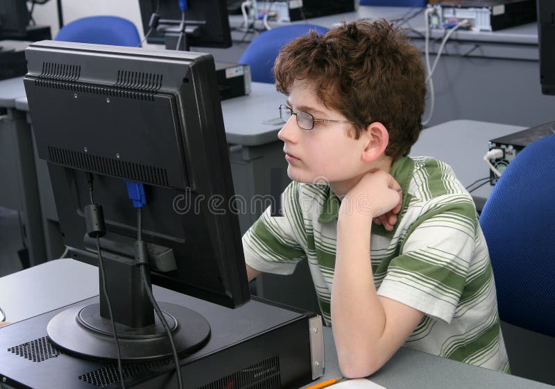 Boy on computer stock image. Image of happiness, college - 8197983