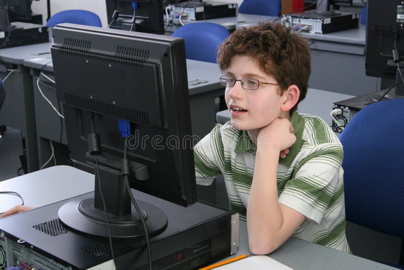Serious Student Working with a Computer Stock Photo - Image of learning ...