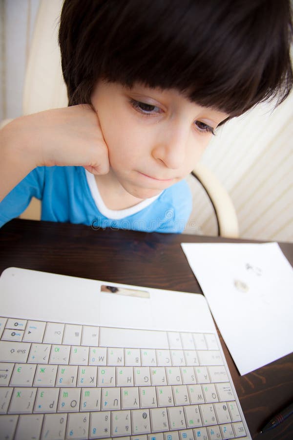 Boy with computer stock image. Image of distant, file - 101969769