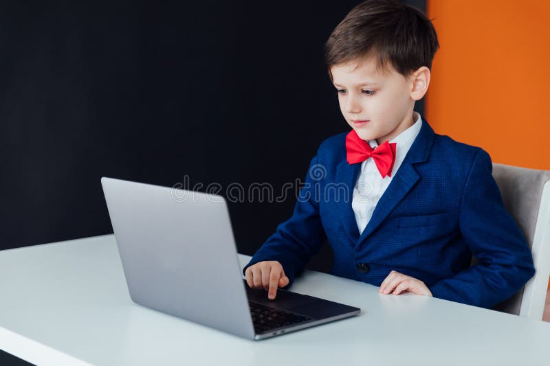 Online Learning Boy at the Computer in the Classroom Stock Photo ...