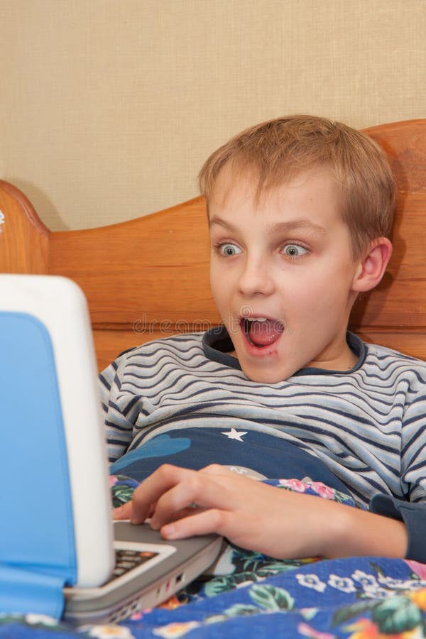 Boy and computer stock image. Image of inside, game - 220248511