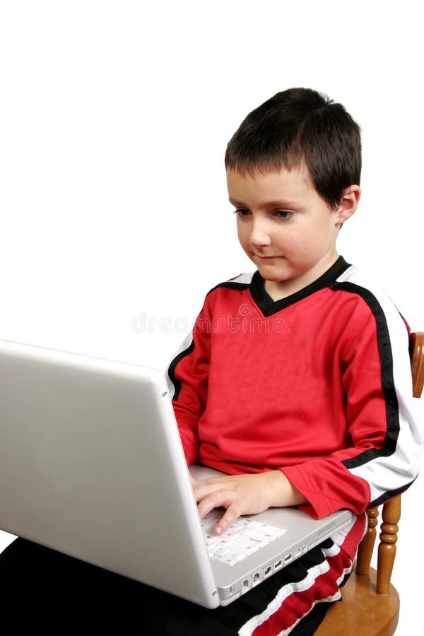Boy with Computer stock photo. Image of concentration - 117914674