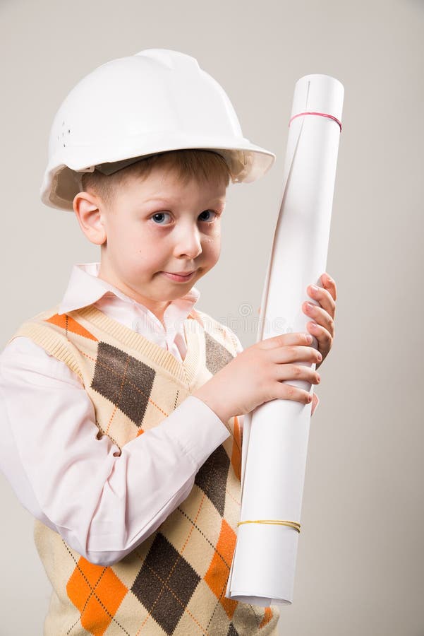 Boy in a Construction Helmet Holding a Drawing Stock Image - Image of ...
