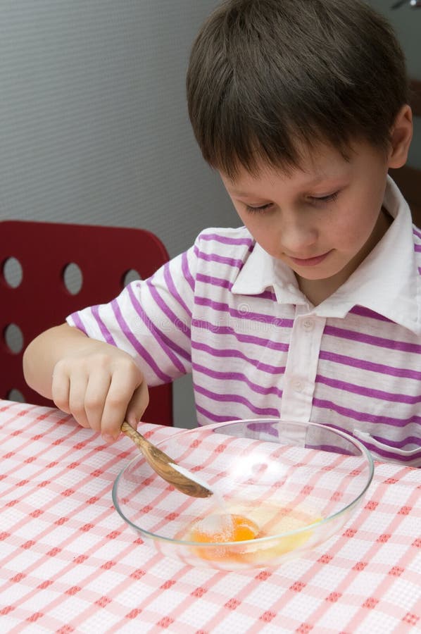 Boy cooking stock photo. Image of plate, stirs, cooking - 13023642