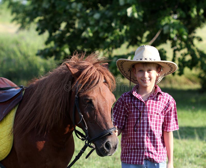 Boy with Cowboy Hat and Horse Stock Photo - Image of country, child ...