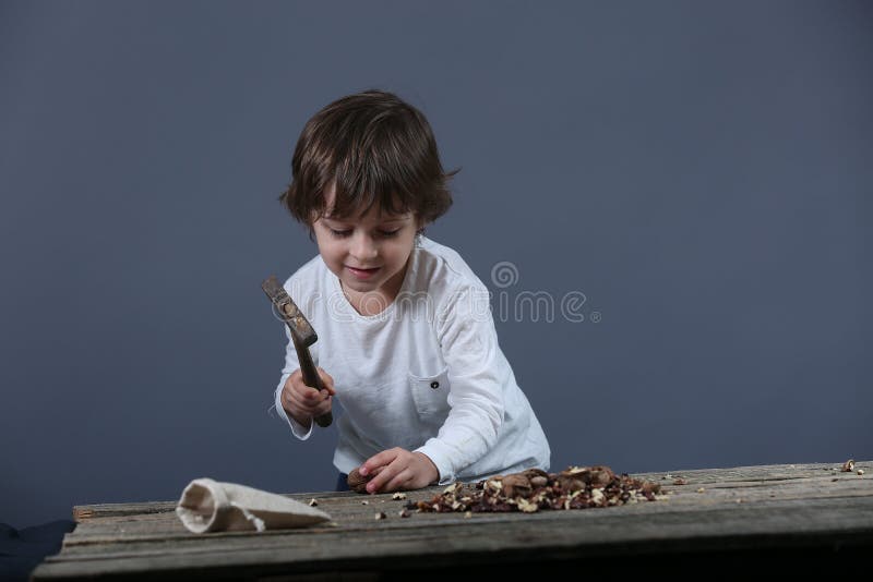 Boy Cracking Nuts Stock Photos - Free & Royalty-Free Stock Photos from ...