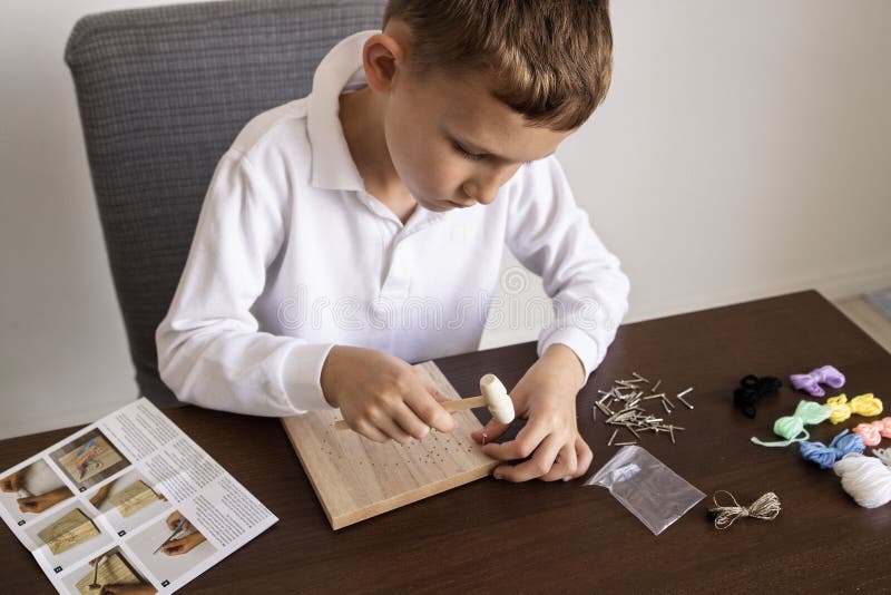 Boy Crafting with a Hammer, Learning and Creating. Handmade Work ...