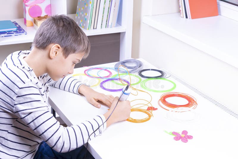 Boy Creating New 3d Object with 3d Pen. Learning and Entertainment at ...